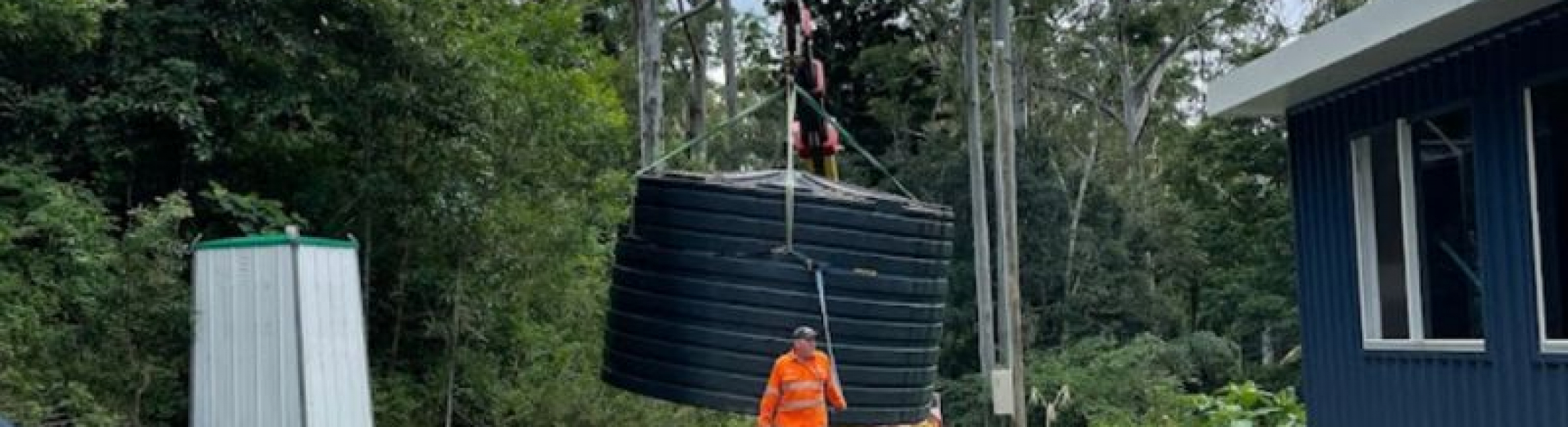 Water Tank Lifts - Mighty Cranes Crane Hire